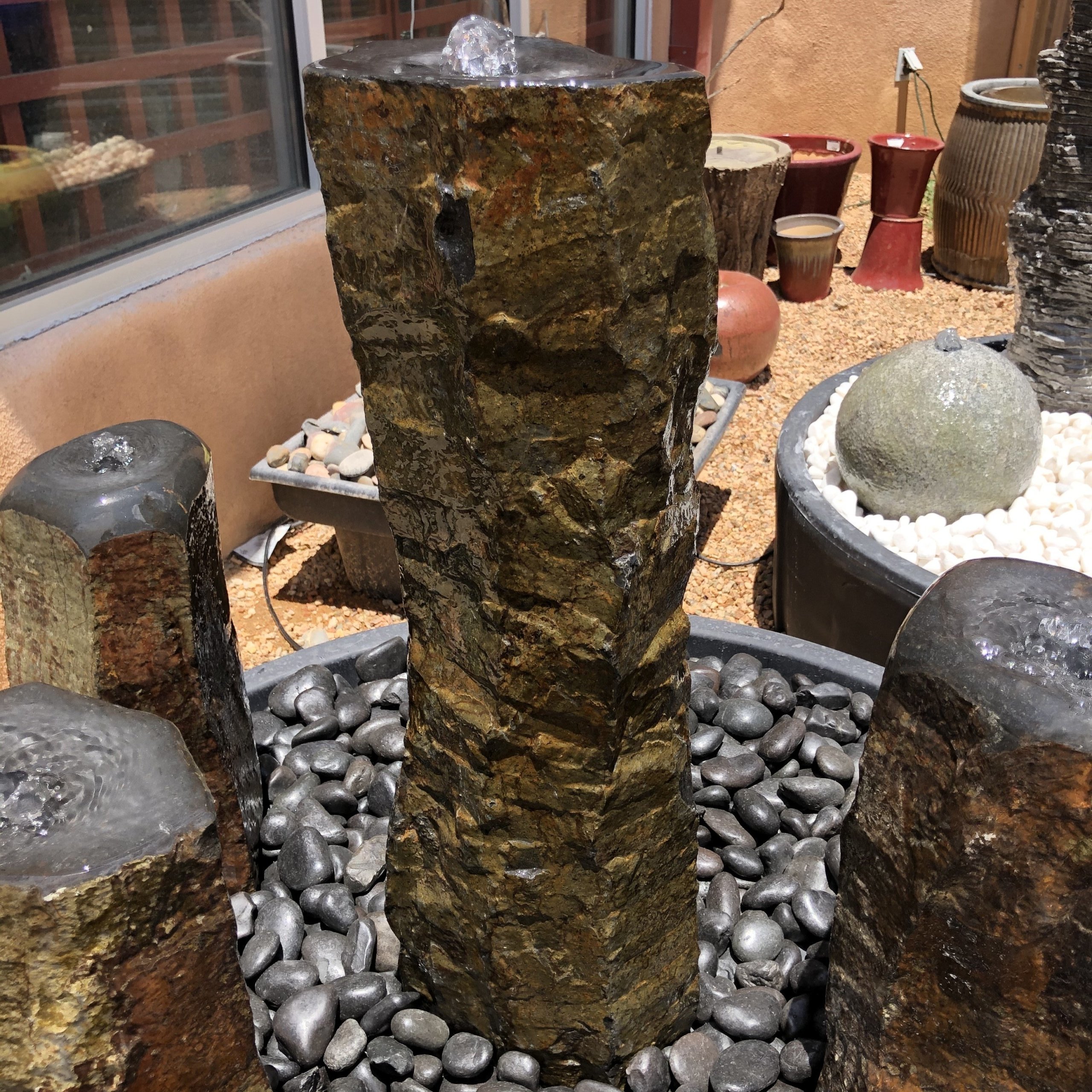 Basalt Fountain with Curved top - McCumber Fine Gardens